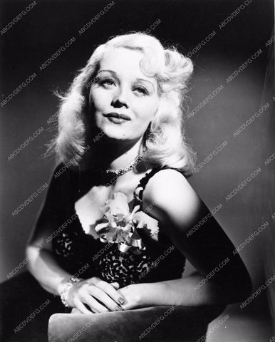 Marion Martin in seated portrait 1220-31 – ABCDVDVIDEO