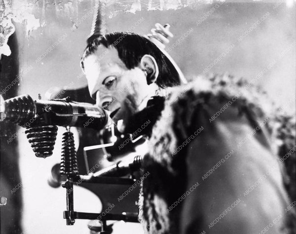 fantastic shot of Jack Pierce in his workshop, prepping Frankenstein h ...