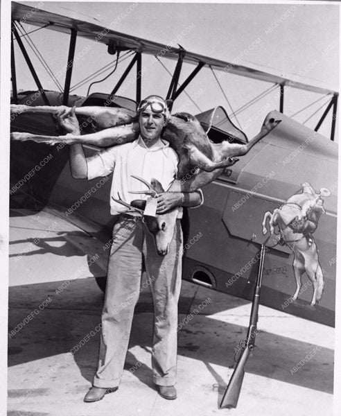 candid cowboy western star Ken Maynard bags a deer and flies it home 3 ...