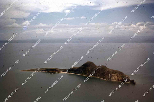 circa 1956 U.S. sailor tours historic Philippines from air in twin eng ...