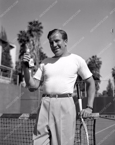 athletic Don Terry enjoys pepsi on the tennis court 45bx05-72 – ABCDVDVIDEO