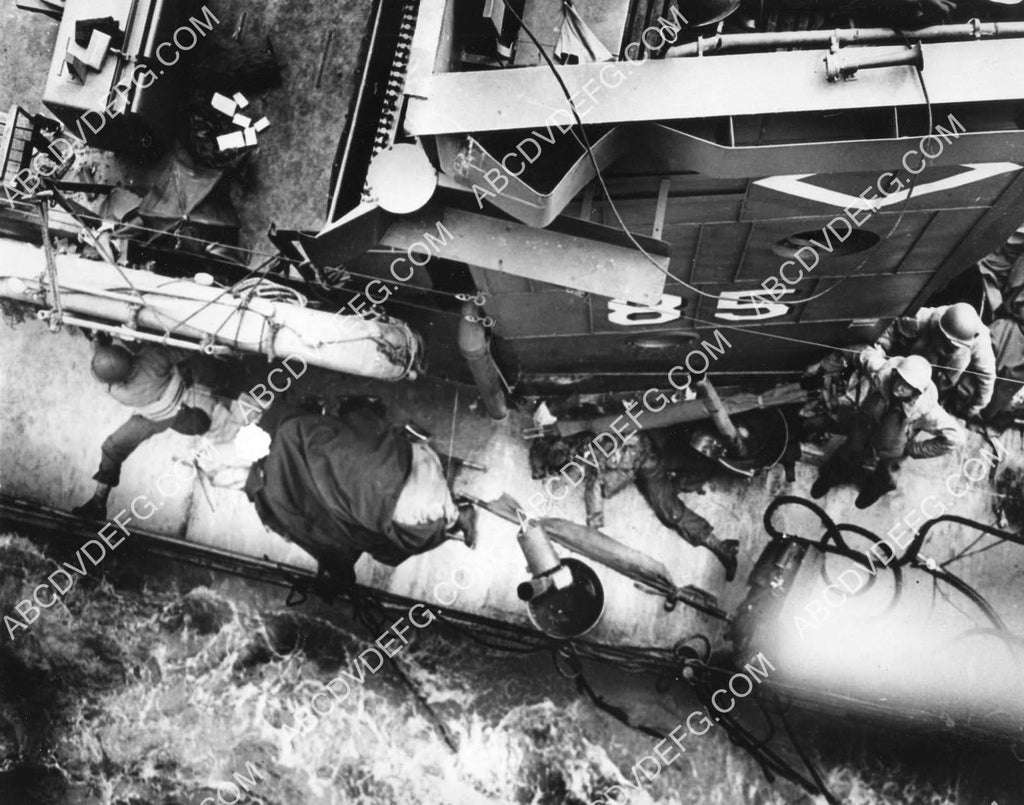 WWII D-Day plus 5 off the Normandy coast Coast Guard LCI takes a hit o ...
