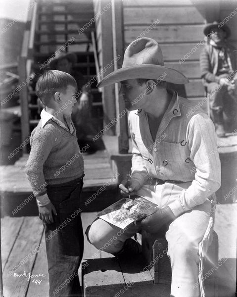 cowboy star Buck Jones signs autograph for fan 8b03-340 – ABCDVDVIDEO