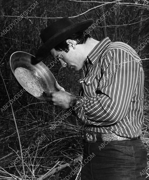 Clint Walker inspecting his gold pan 8b20-10696 – ABCDVDVIDEO
