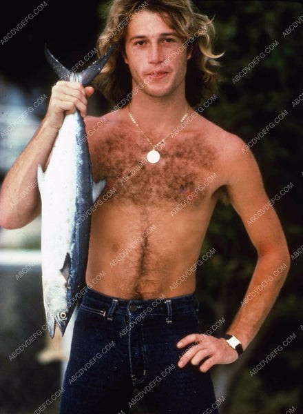 Andy Gibb shows off his fishing catch 8b20-13724 – ABCDVDVIDEO