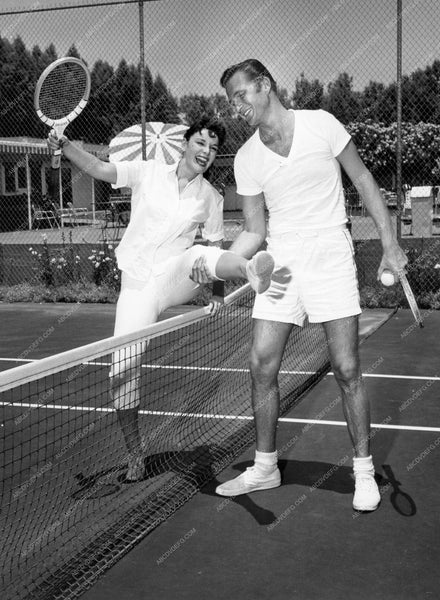 athletic Eric Fleming and wife on the tennis court 8b20-14538 – ABCDVDVIDEO