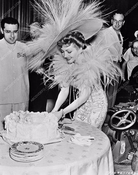 Claudette Colbert cutting a very large Birthday Cake 8b20-8870 ...