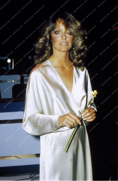Farrah Fawcett and a flower 8b20-9636 – ABCDVDVIDEO