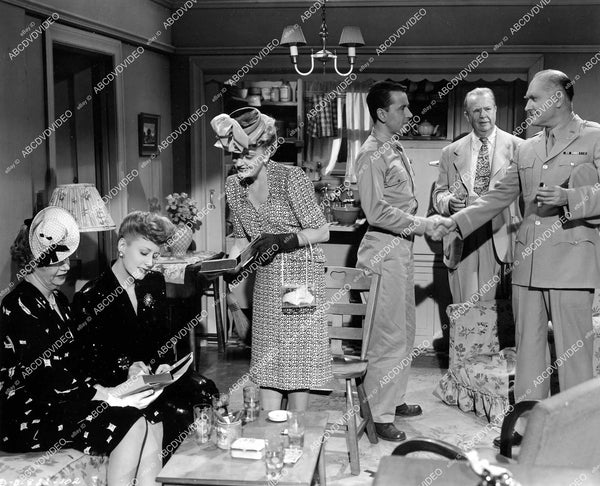crp-12928 1945 Irene Dunne at the tea party film Over 21 crp-12928 ...